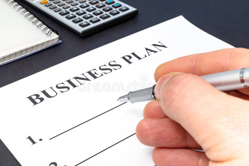 Strategy Business Plan with Pen, Calculator and Notebook on Dark Table ...