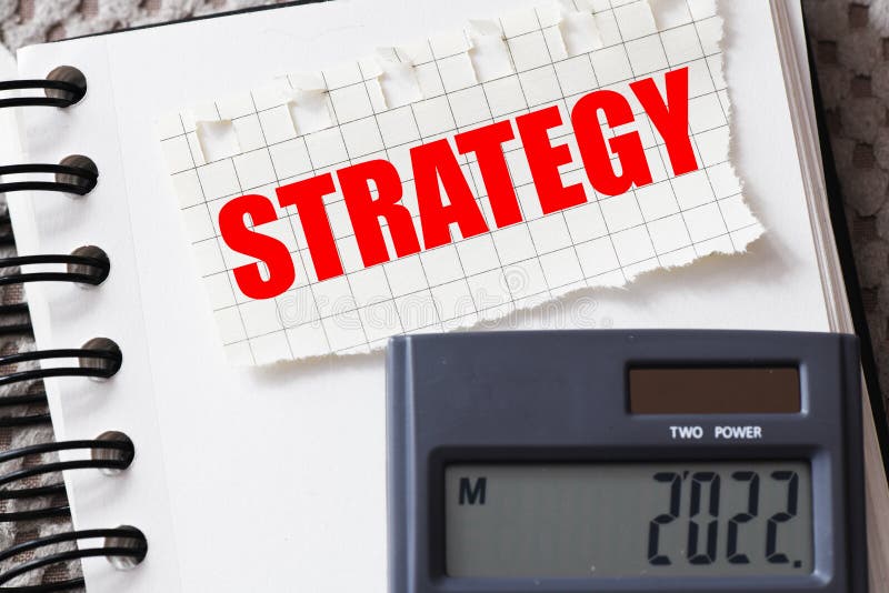STRATEGY on a Piece of Paper Placed on the Notebook. Concept for ...