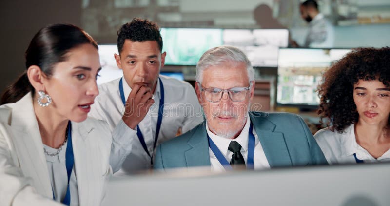 Strategy, Planning and Security Team at Computer in Control Room for ...