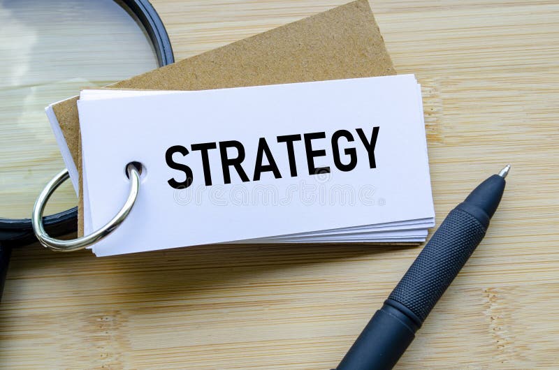 Strategy Text on Notepad Portraying Focused Business Planning and Long ...