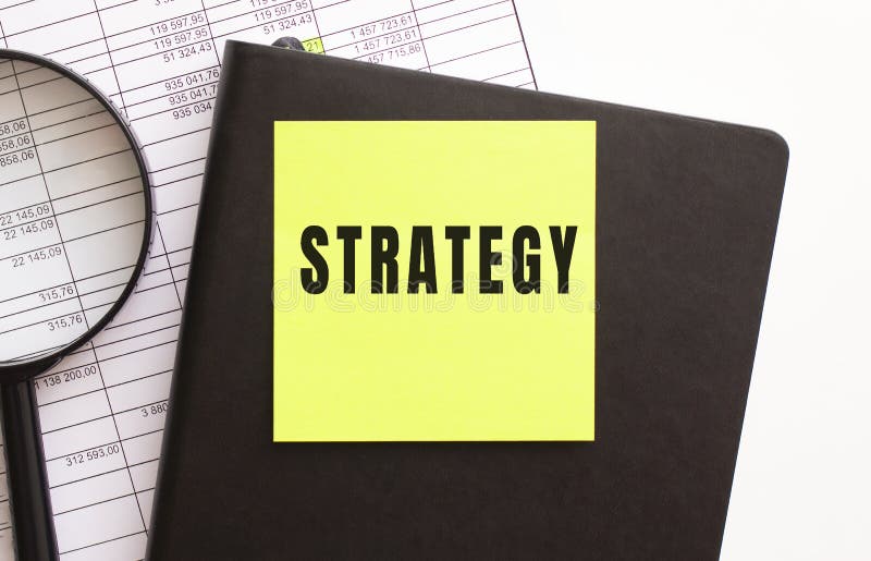 STRATEGY Text on a Sticker on Your Desktop. Diary and Magnifier Stock ...