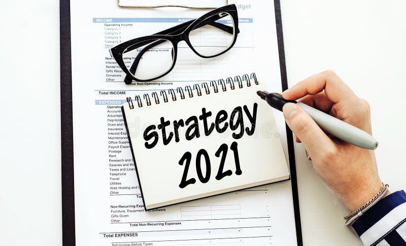 STRATEGY 2021 Text Written by Business Woman in Her Diary on Office ...
