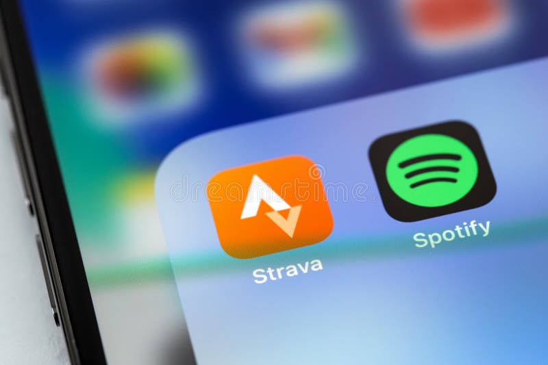 Strava and Spotify Mobile Apps on the Screen Smartphone Editorial Stock ...