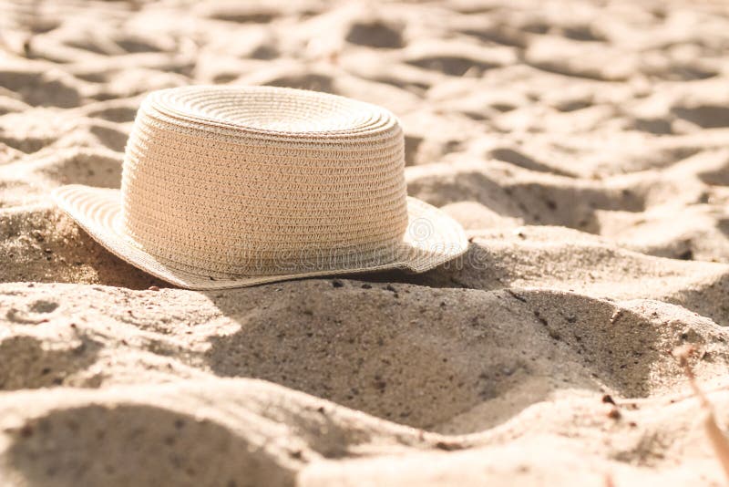 Straw Beach Hat with Brim for Sun Protection on the Sand. Stock Image ...
