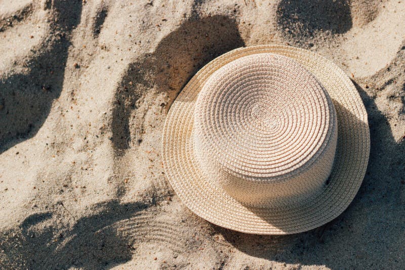 Straw Beach Hat with Brim for Sun Protection on the Sand. Stock Image ...