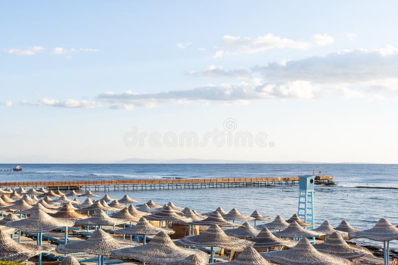 Straw Beach Umbrella with Blue Sky. Stock Photo - Image of scenic ...