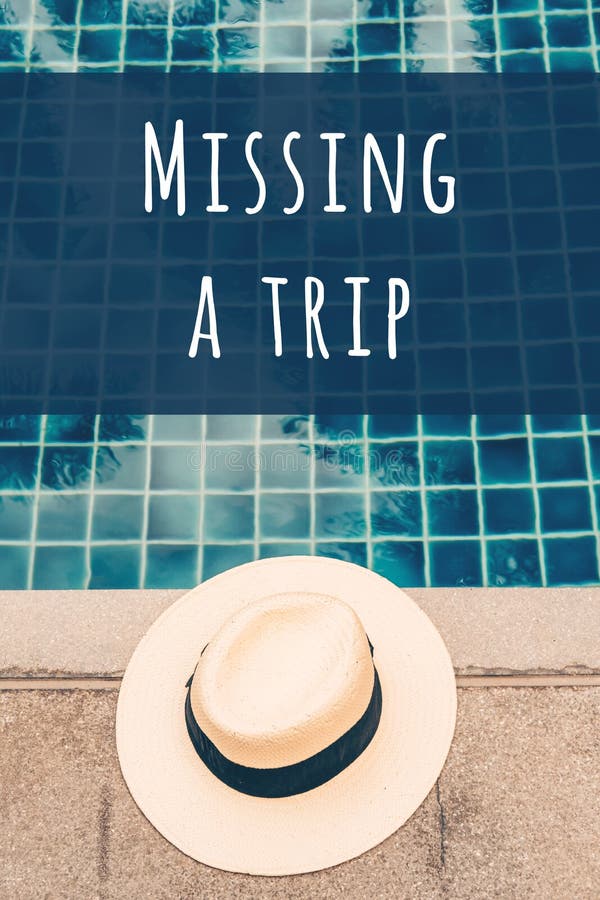 Straw Hat at the Pool Edge with Palm Reflections in the Water with ...