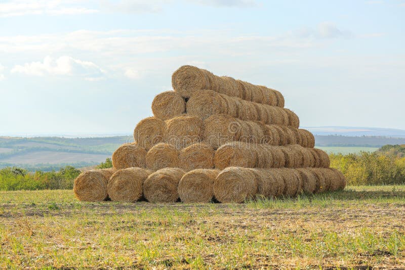 Straw Pyramid stock image. Image of grain, clouds, bales - 77739501
