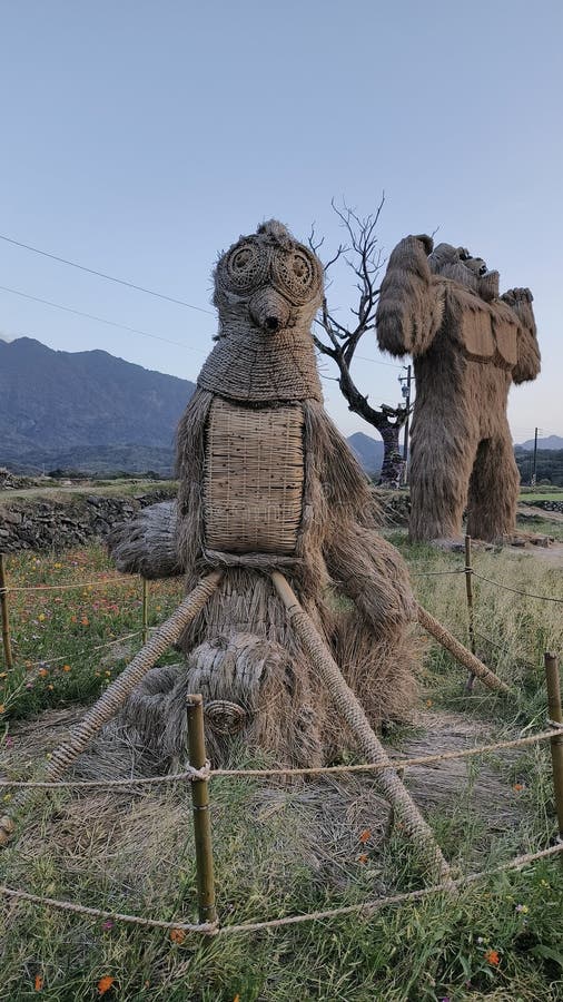 Straw statue in the park stock image. Image of rock - 284221331
