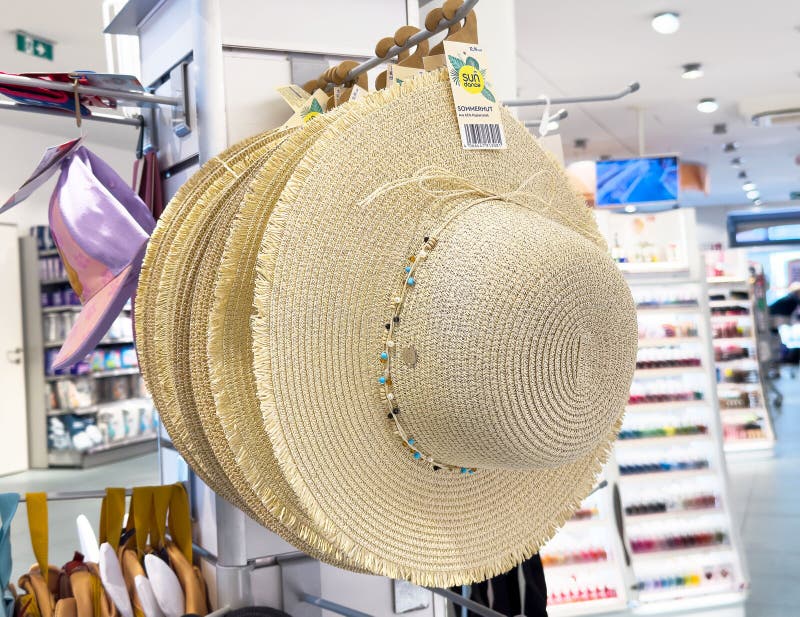 Straw Sun Hats Displayed in Modern Retail Store Interior with ...