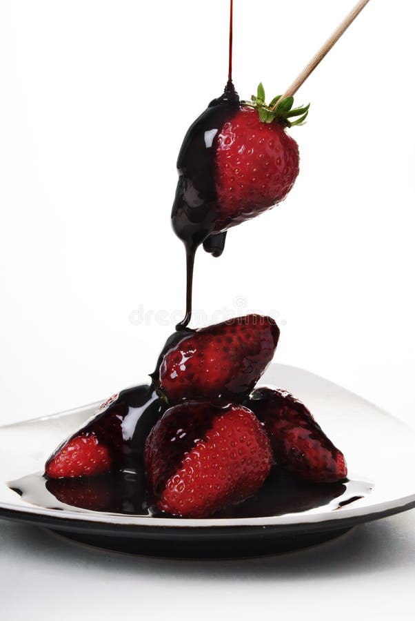 Pouring Melted Chocolate Over Strawberries Stock Photo - Image of ...