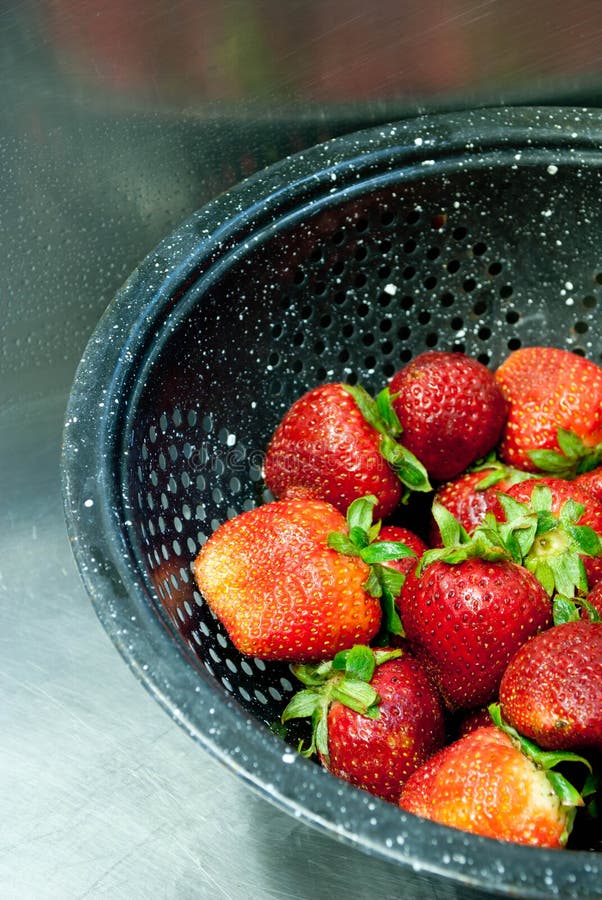 Red Strawberries in Colander on a White Wooden Table Stock Image ...