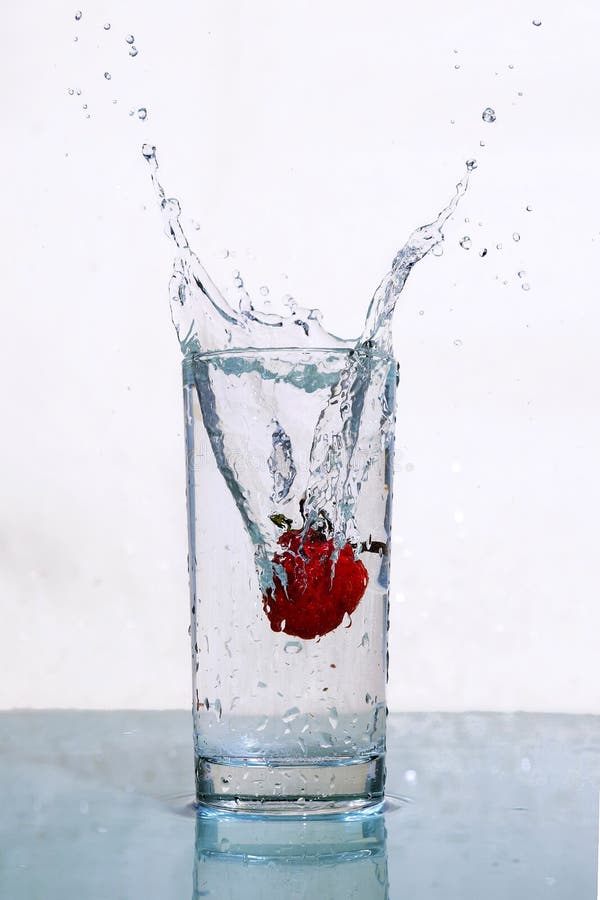 Strawberries Fall into a Glass of Water. Stock Photo - Image of thirst ...
