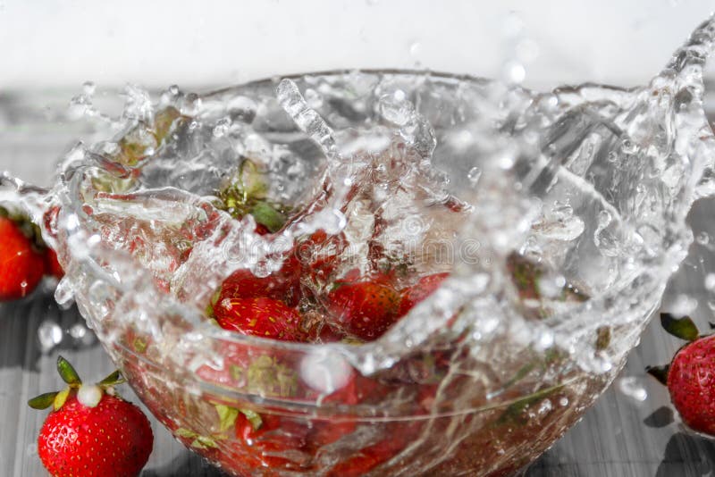 Strawberries Falling in Water with Spray Stock Image - Image of ...