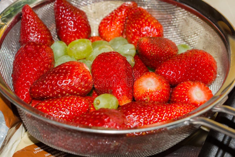 Strawberries and grapes stock image. Image of dessert - 90917017