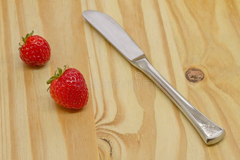 Strawberries and knife stock photo. Image of freshness - 31318644