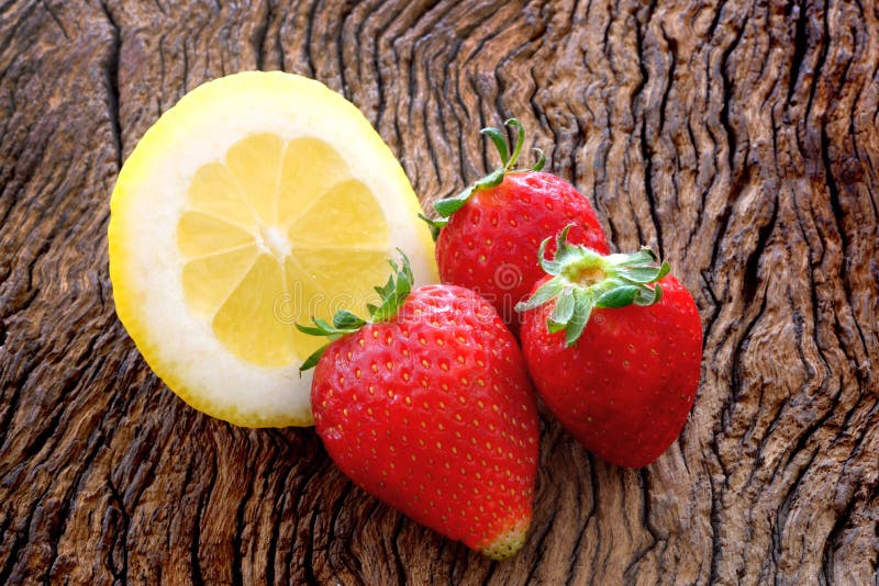 Strawberries and lemon stock image. Image of splash, table - 69723739