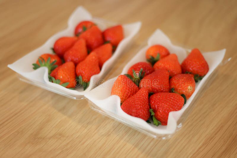 Strawberries in a pack stock image. Image of fruit, lots - 325269663