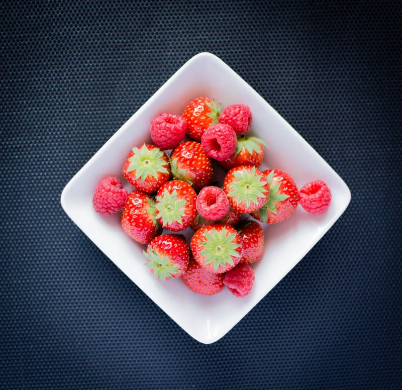 Strawberries, raspberries stock photo. Image of leaf - 34145280
