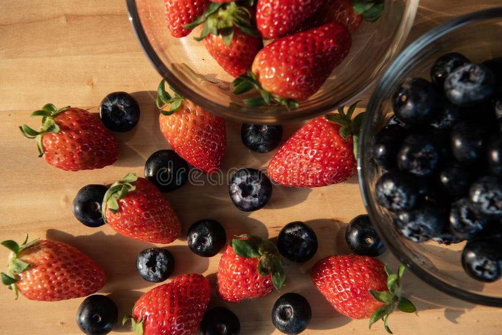 Strawberries and Raspberry on the Table Stock Image - Image of food ...