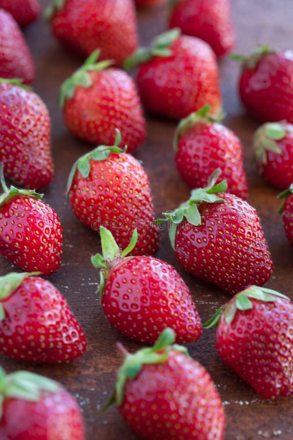 Strawberries Ripe on a Rustic Rust Background. Stock Image - Image of ...