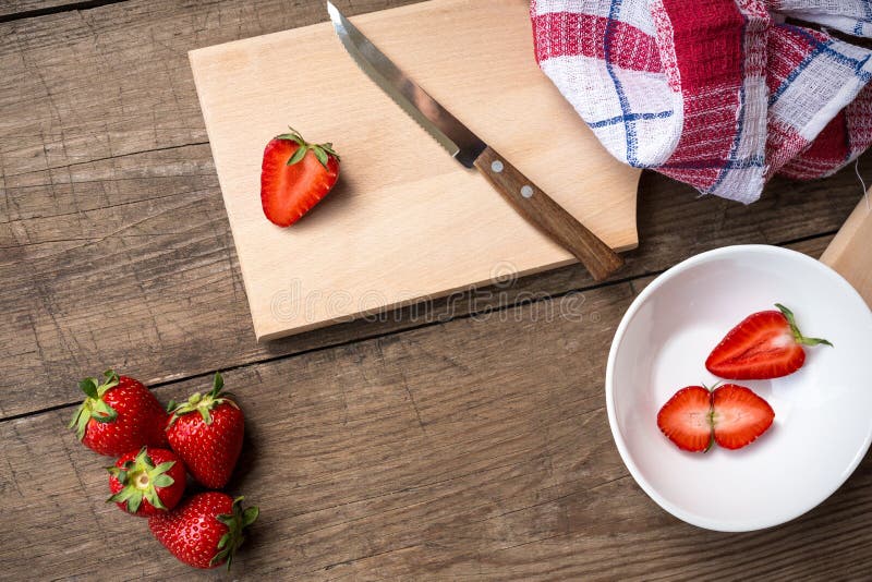 Strawberries Sliced on Chopping Board Stock Image - Image of leaf ...