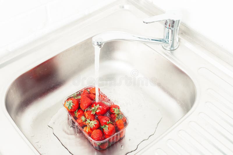 Strawberries are Washed in Water. Pure Fruit is Health Stock Image ...
