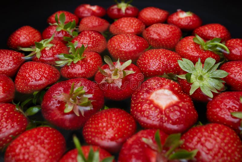Strawberries in water stock image. Image of black, strawberries - 55678395