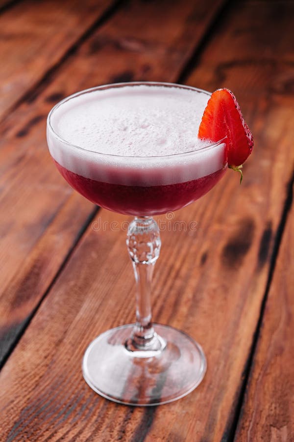 Strawberry Alcoholic Cocktail with Foam on Wood Stock Photo - Image of ...