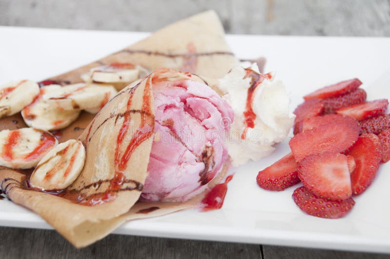 Strawberry banana crape. stock image. Image of cream - 35984435