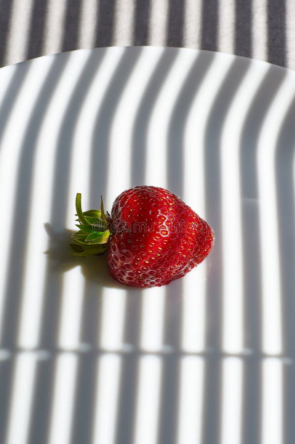 Strawberry Berry on a Plate and Striped Shadow Stock Photo - Image of ...
