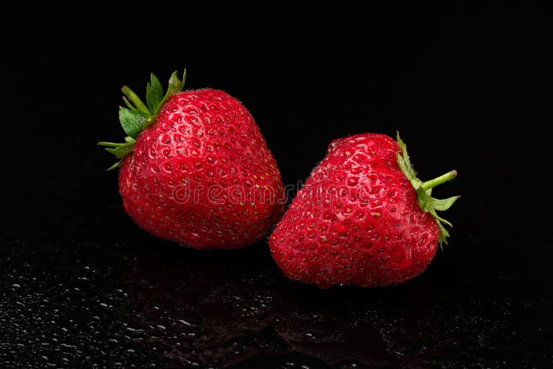 Strawberry on Black stock photo. Image of green, juicy - 184628074