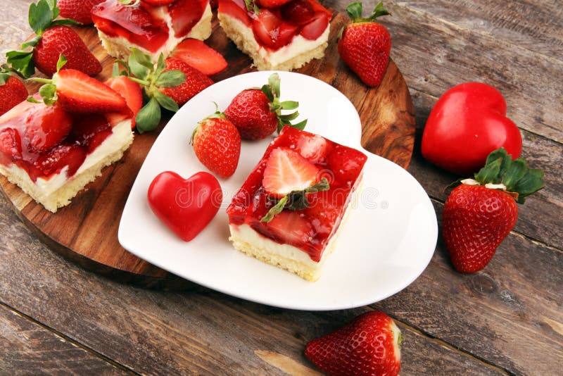 Strawberry Cake and Many Fresh Strawberries on Rustic Table Stock Photo ...