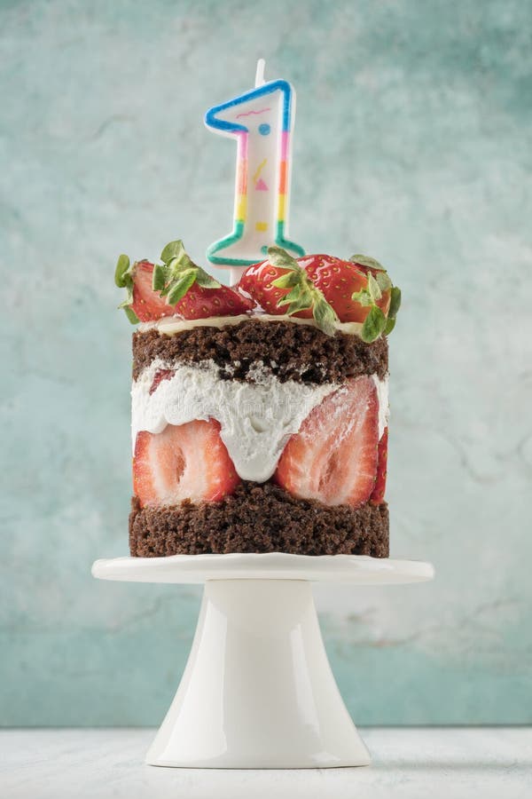 Strawberry Cake with Number One Shaped Candle for Birthday Stock Image ...