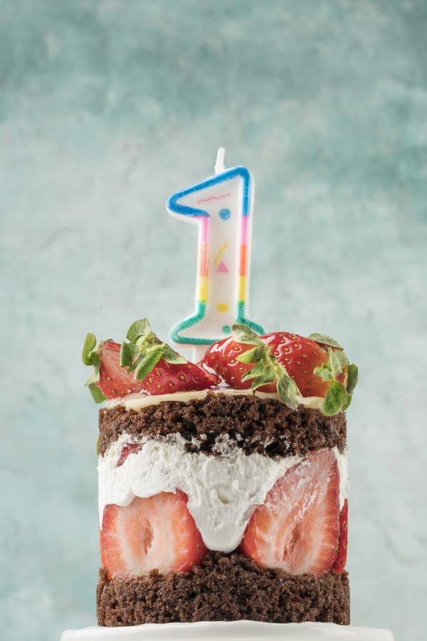Strawberry Cake with Number One Shaped Candle for Birthday Stock Photo ...
