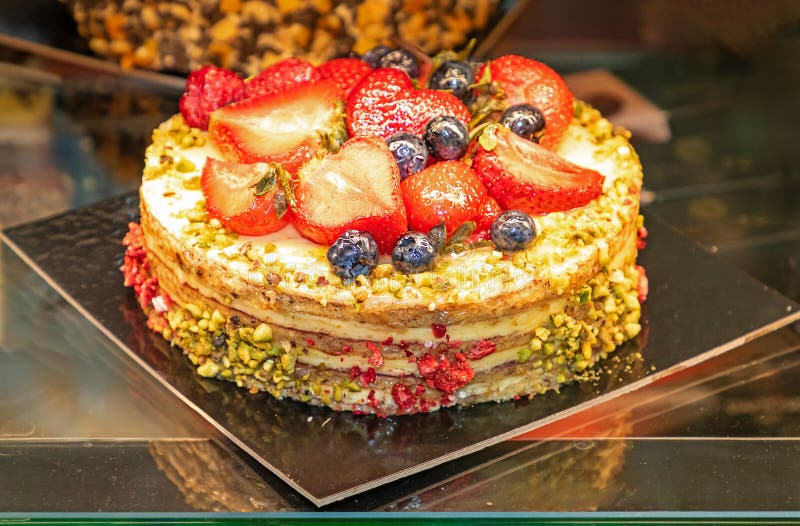 Strawberry cake on shelf stock photo. Image of shelf - 356316110