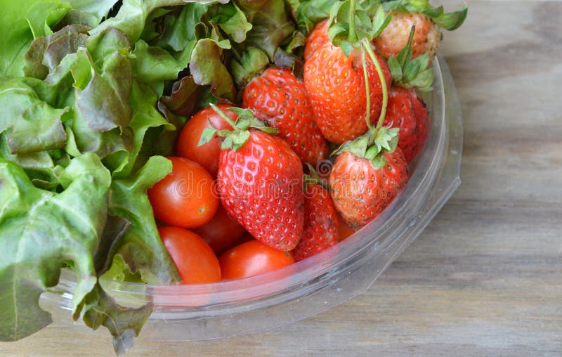 Strawberry and Cherry Tomato with Vegetable on Plastic Tray Stock Image ...
