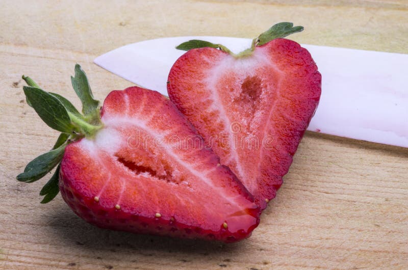 Strawberry Cut Half Half Stock Photos - Download 7,343 Royalty Free Photos