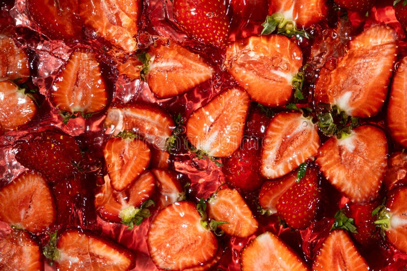 Strawberry Dropped into Water. Splash Effect and Vibrant Summer Look ...