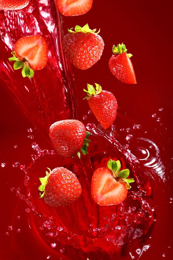Strawberry Falling into the Lot of Juice Stock Image - Image of fruit ...