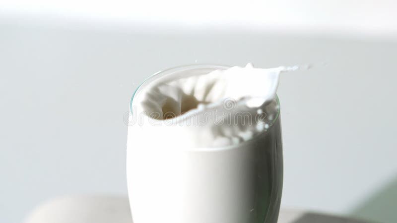 Strawberry Falling into Milk Glass Stock Video - Video of liquid ...