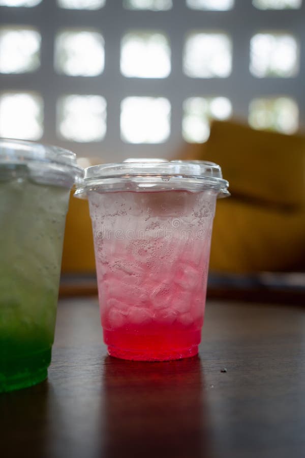 Strawberry Italian Soda with Ice Stock Photo - Image of plastic, space ...