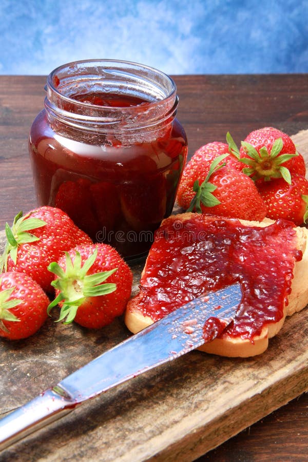 Spread jam on bread stock image. Image of fruity, marmalade - 28379691