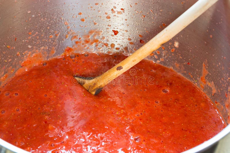 Strawberry Jam Cooking in a Pot with Wooden Spoon. Stock Image - Image ...