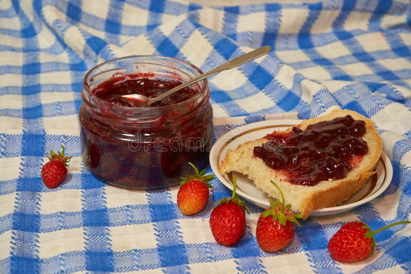 Strawberry Jam,a Jar with Jam and Bread Smeared with Boiled ...