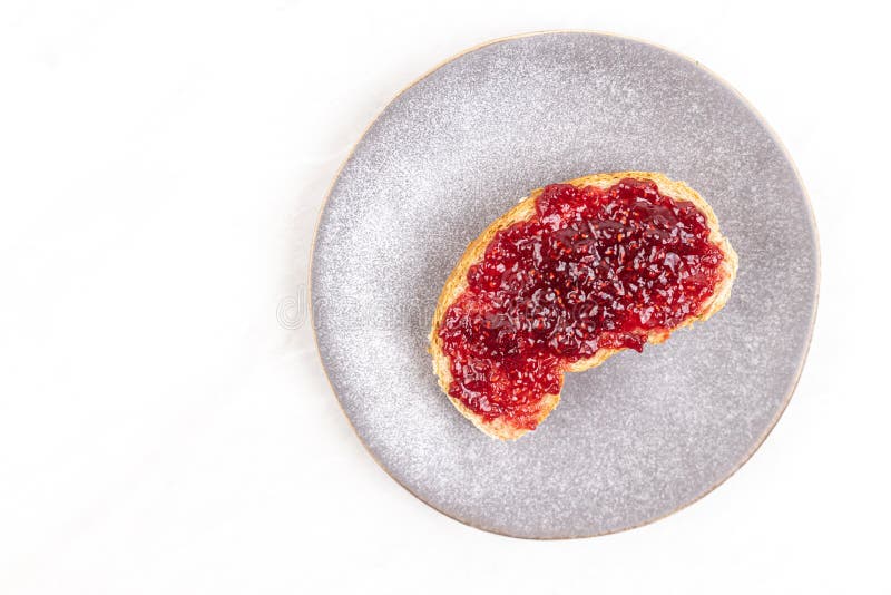 Strawberry Jam Spread on the Bread Served Stock Photo - Image of ...