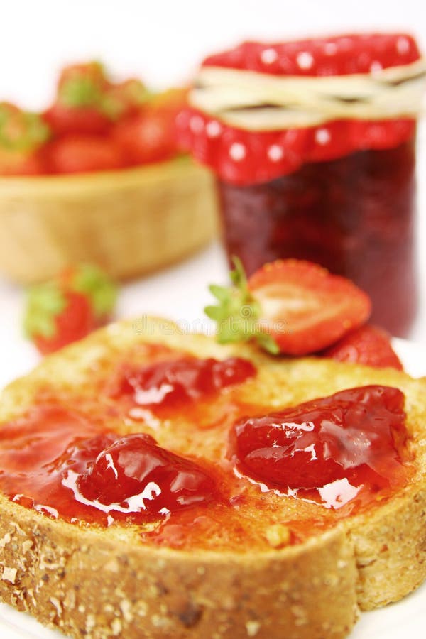 Strawberry jam on toast stock photo. Image of berry, ripe - 16087526