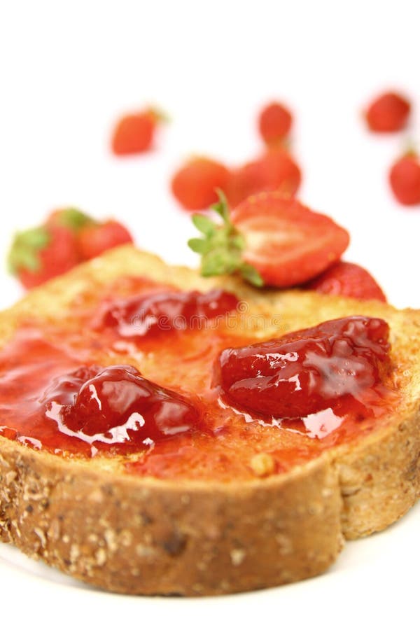 Strawberry jam on toast stock photo. Image of ripe, breakfast - 16423552