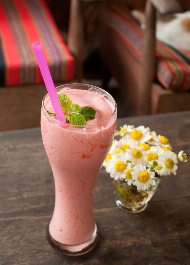 Happy Girl is Holding Stylized Mason Jar Cup of Pink Coffee with ...