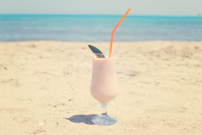 Strawberry Milkshake on the Beach Decorated with Lime Stock Image ...